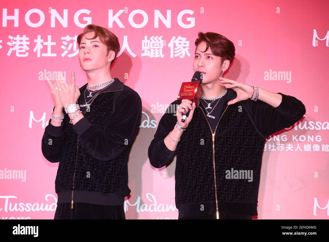 Hong Kong singer and actor Jackson Wang, right, of South Korean boy ...