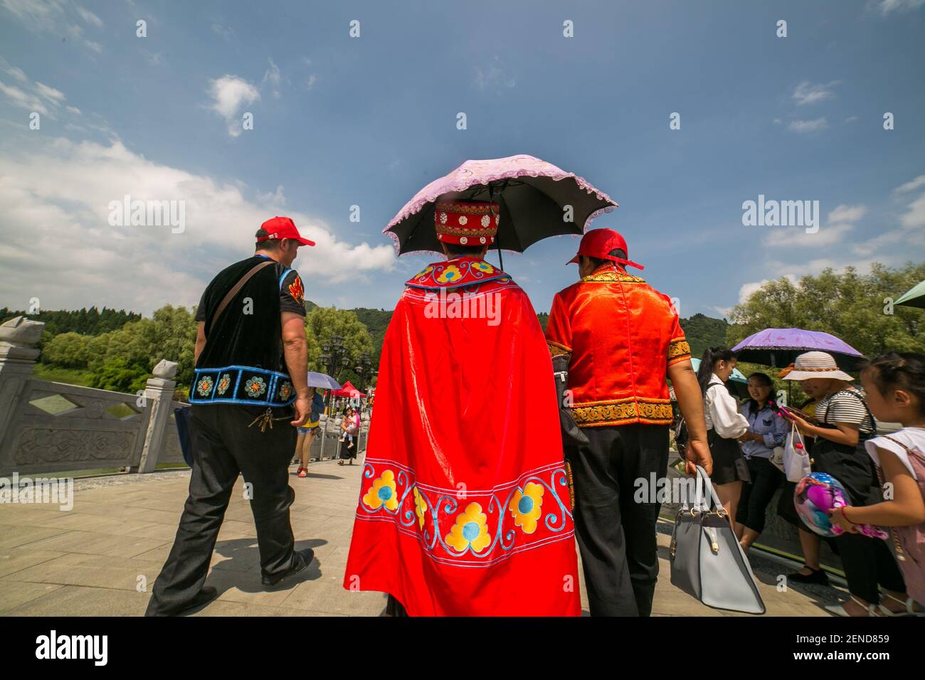 Chinese people of Yi ethnic group dressed in traditional costumes ...