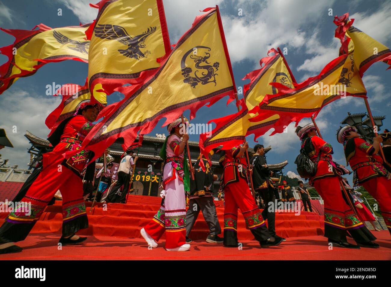 Chinese people of Yi ethnic group dressed in traditional costumes ...