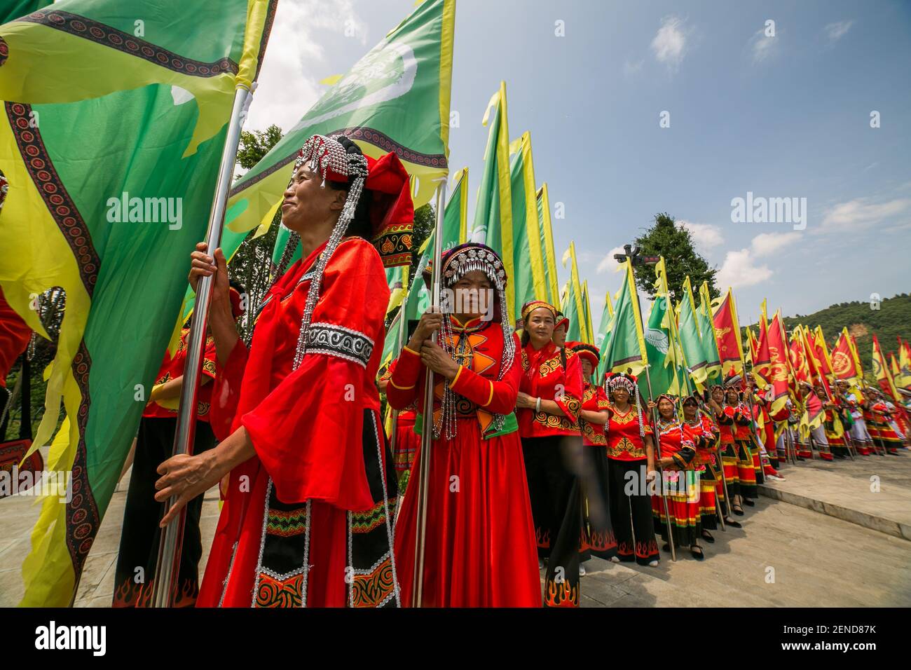 Chinese people of Yi ethnic group dressed in traditional costumes ...