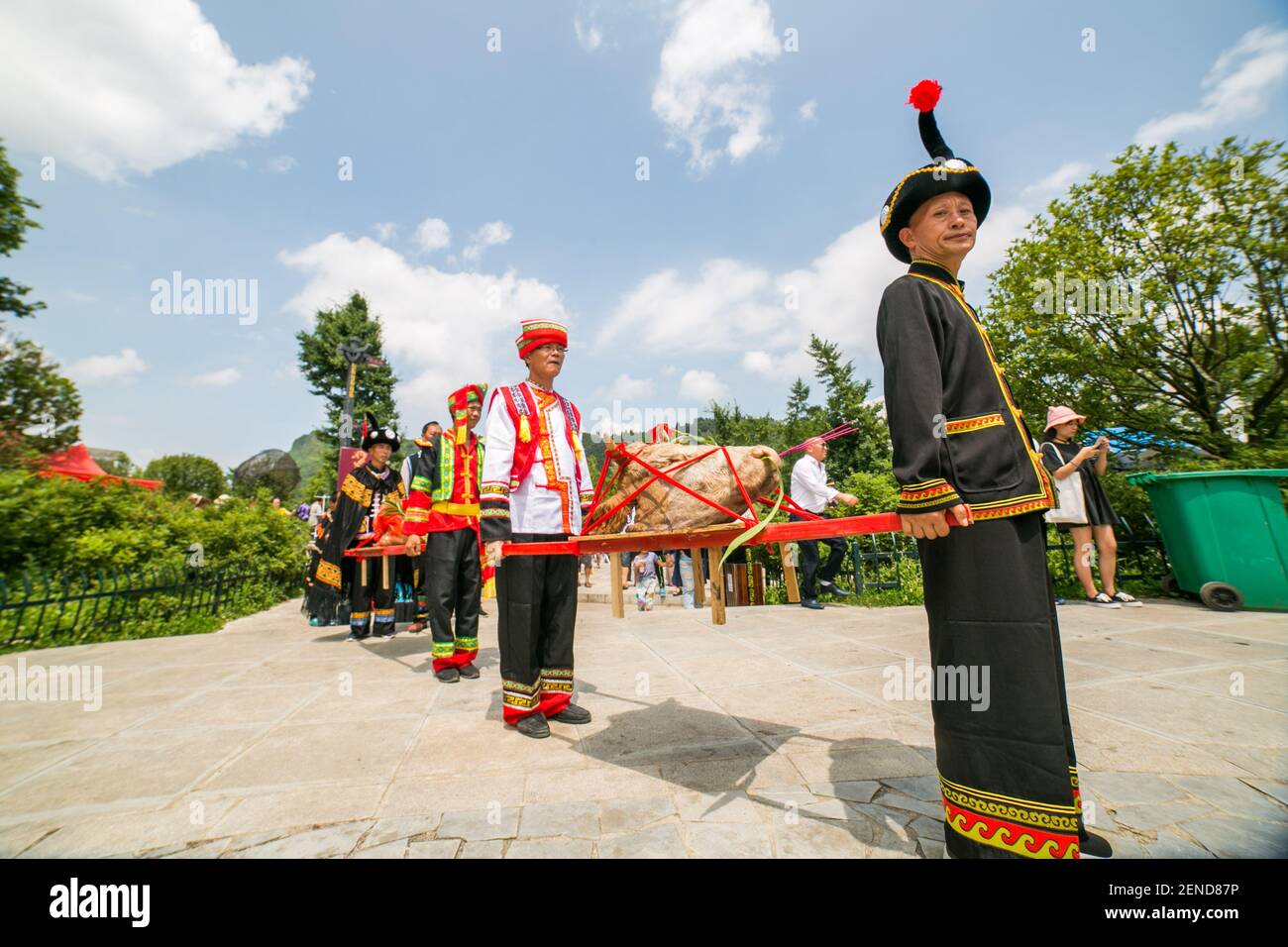 Chinese people of Yi ethnic group dressed in traditional costumes ...