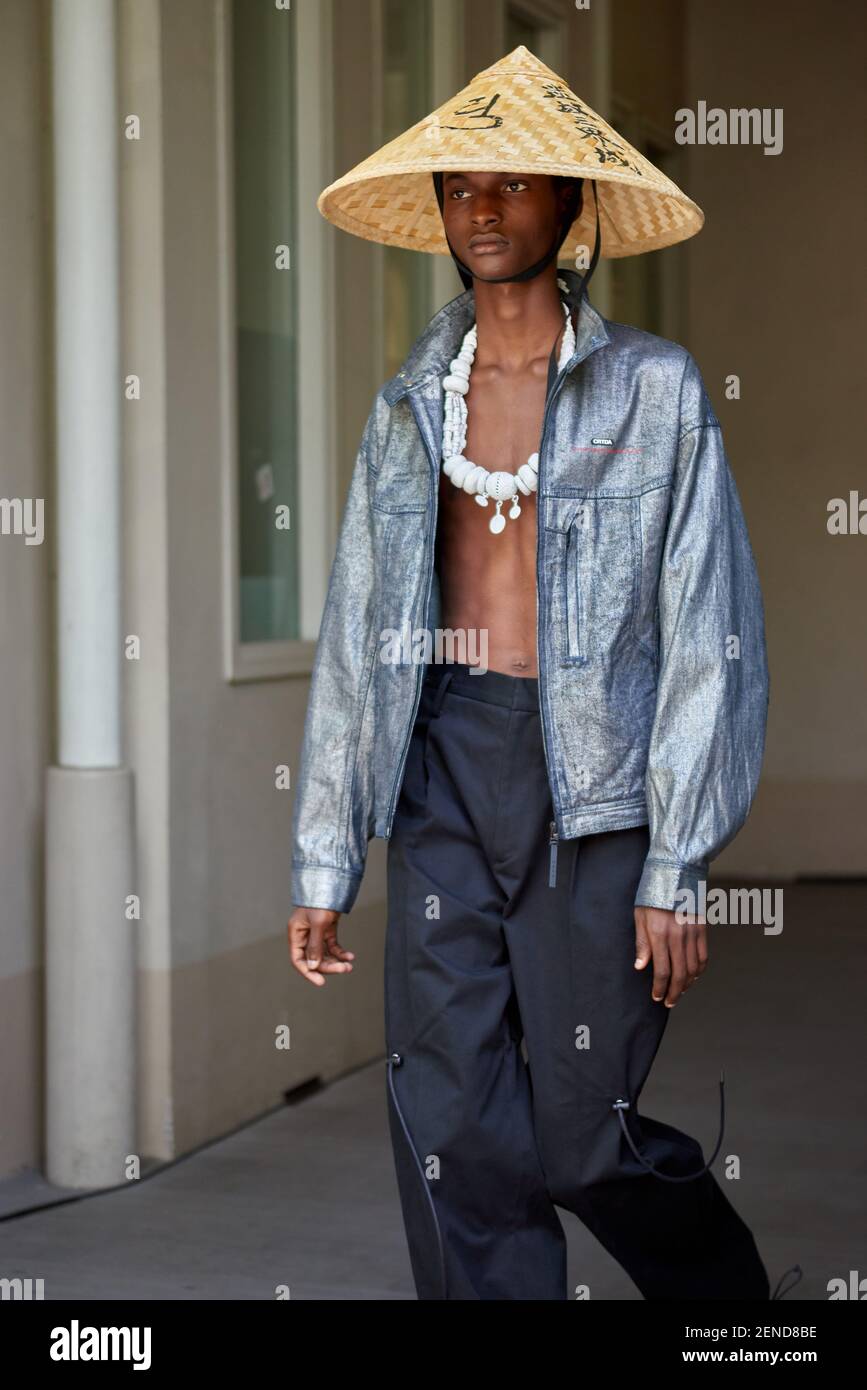 Models are pictured backstage after finishing hair and makeup at the ...