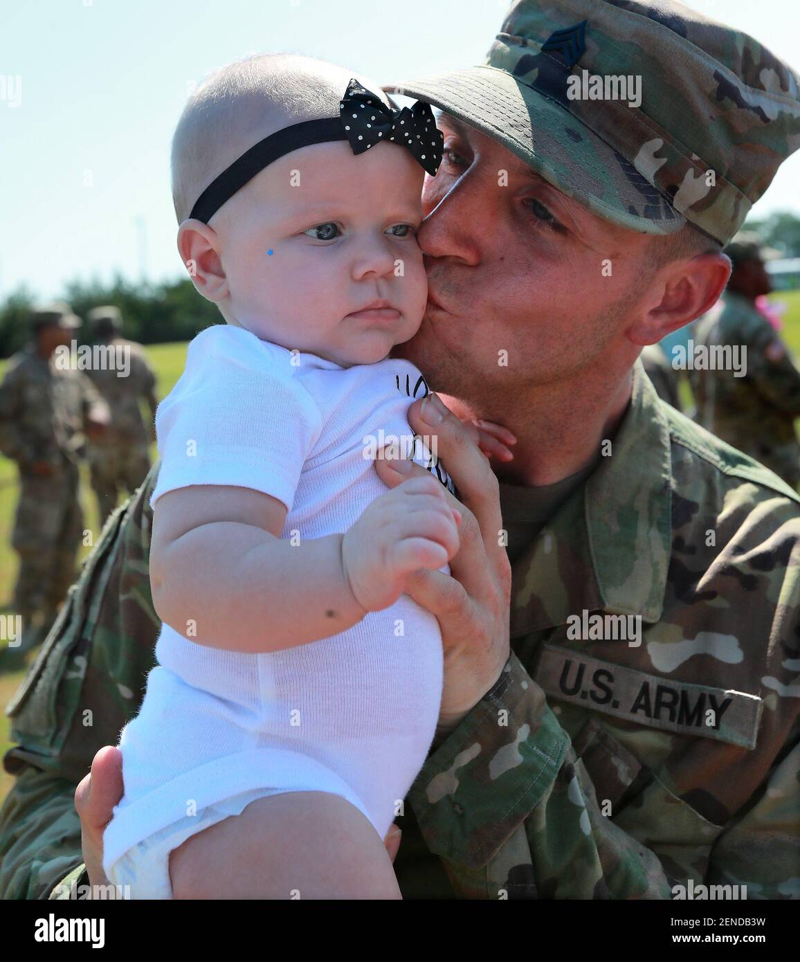 July 30, 2019 Fort Stewart: Sergeant Jason Calahan, Savannah, kisses ...