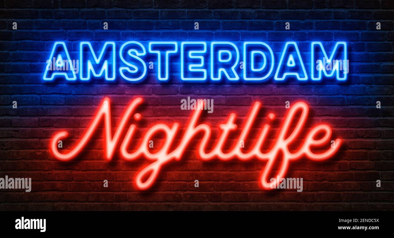 Neon sign on a brick wall - Amsterdam Nightlife Stock Photo - Alamy