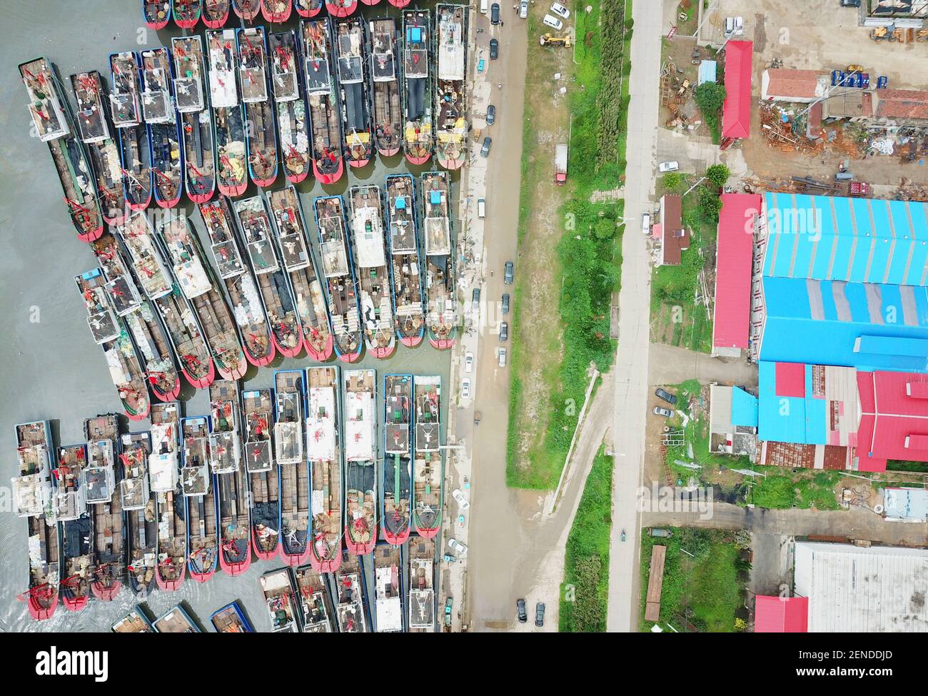 Aerial view of fishing boats coming together at Qingyu fishing port at ...