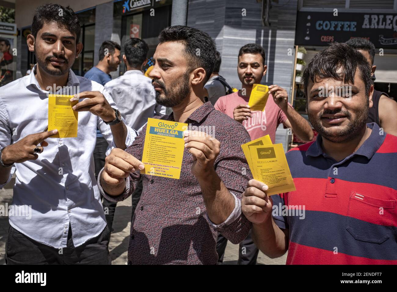 Workers hold leaflets during the protest. Cyclists and motorcyclists ...