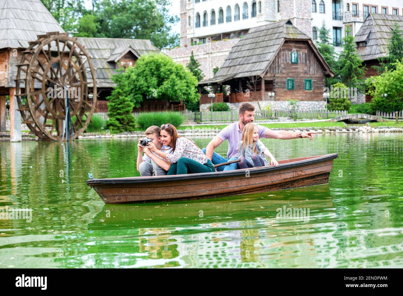 Happy family boating and having fun, family concept Stock Photo - Alamy