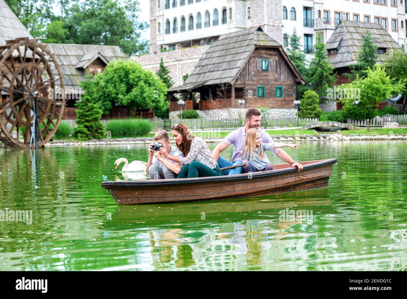 Happy family boating and having fun, family concept Stock Photo - Alamy