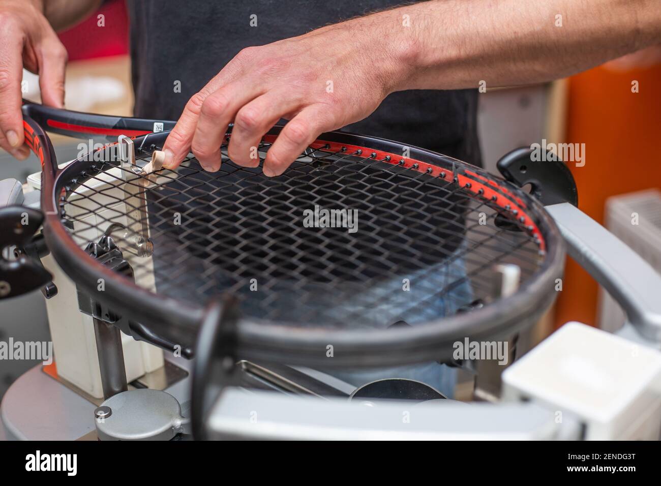 Stringing the tennis racket in the tennis studio Stock Photo - Alamy
