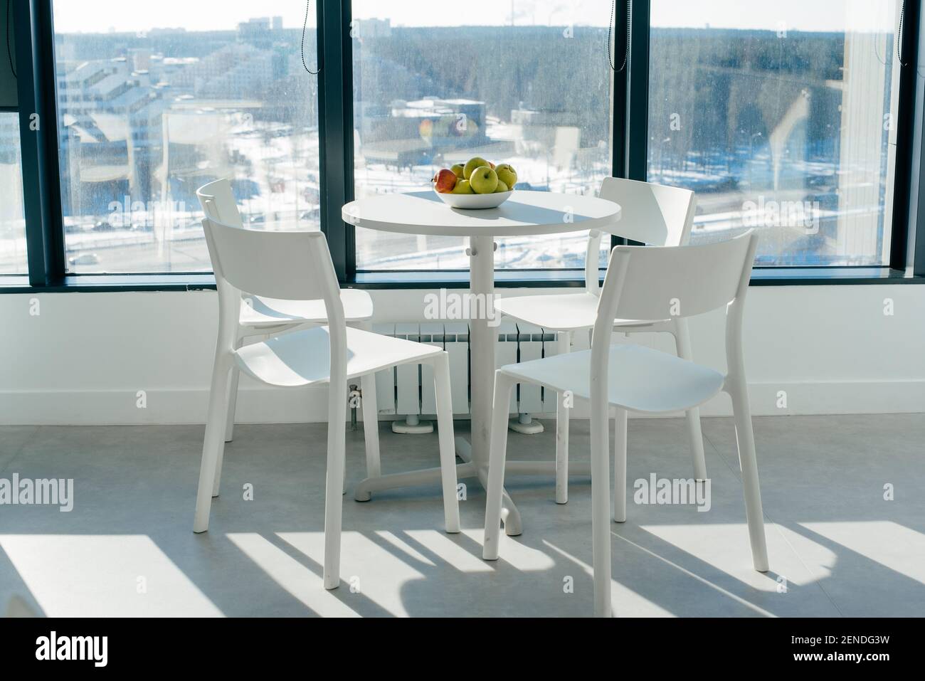 beautiful kitchen in the office with large panoramic windows and city ...