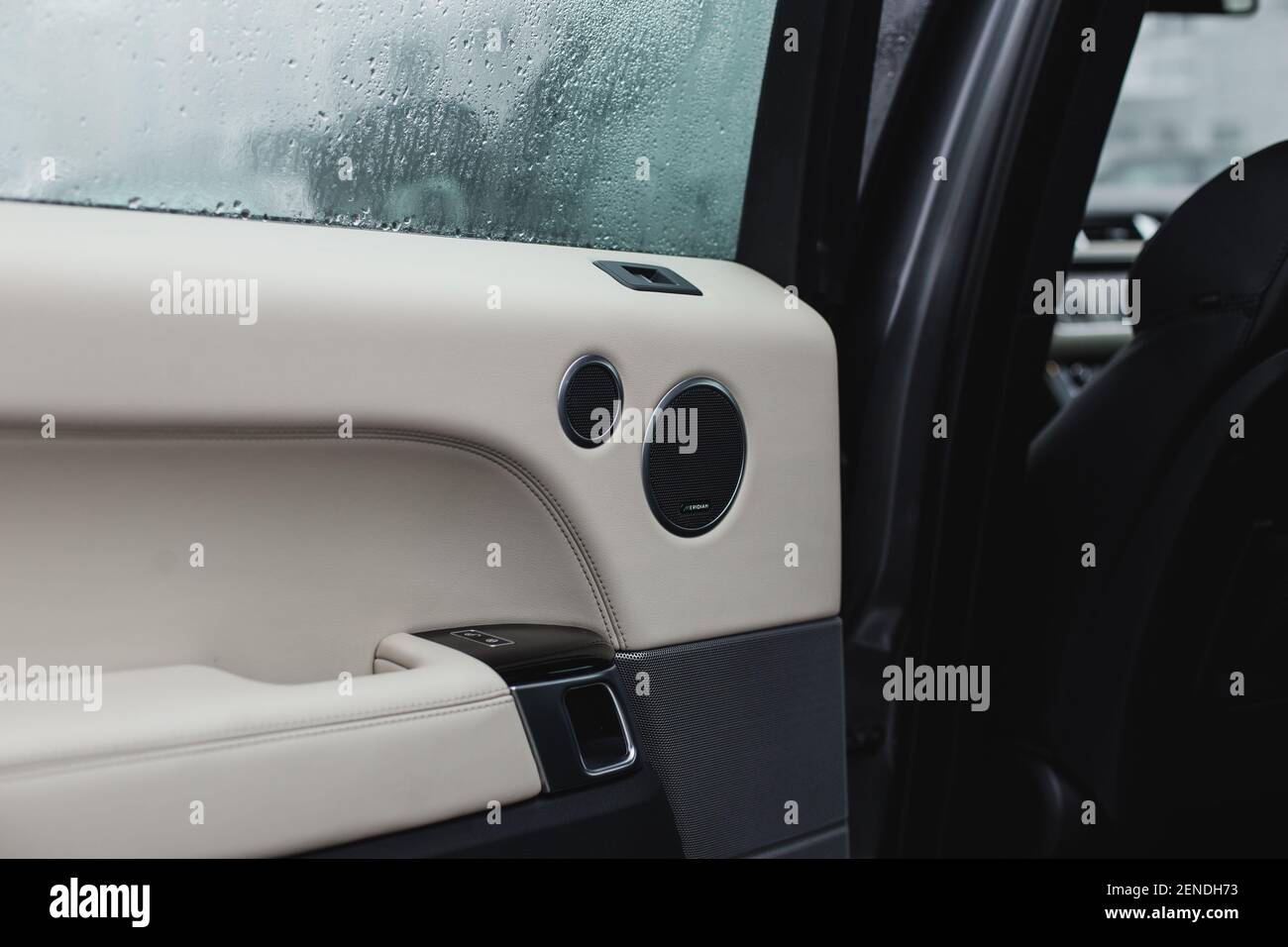 inside car door with beige and black leather Stock Photo - Alamy