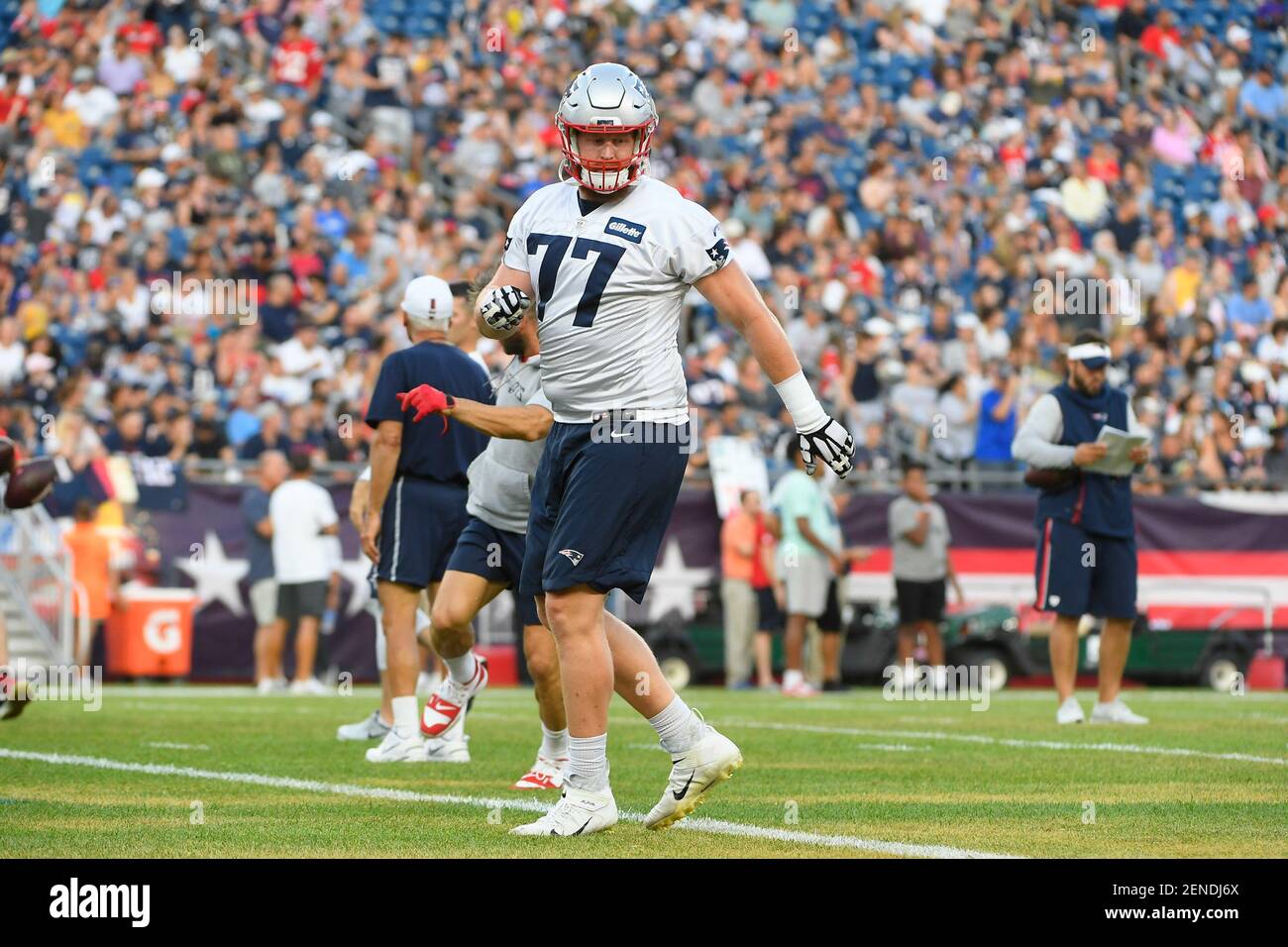 July 29, 2019: New England Patriots offensive lineman Cedrick Lang (77) warms up at the New ...