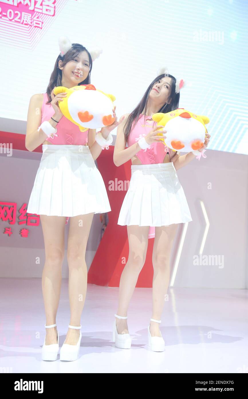 Chinese showgirls pose during the 17th China Digital Entertainment Expo ...