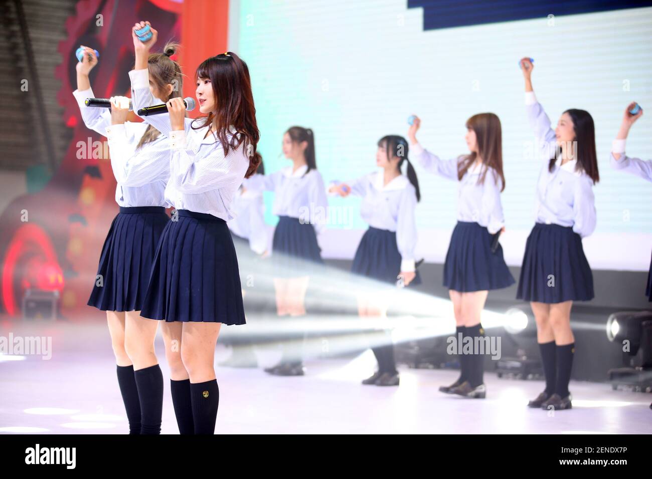 Chinese showgirls pose during the 17th China Digital Entertainment Expo ...
