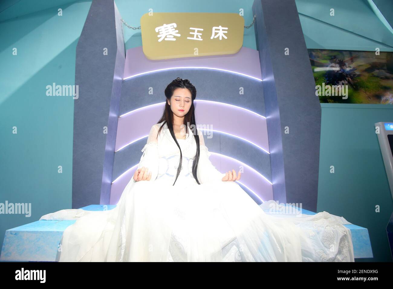 Chinese showgirls pose during the 17th China Digital Entertainment Expo ...