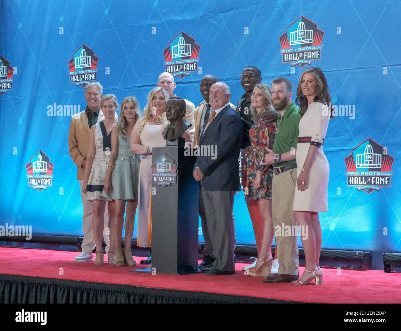 August 3rd, 2019: Pat Bowlen's children posing with his bust during the ...