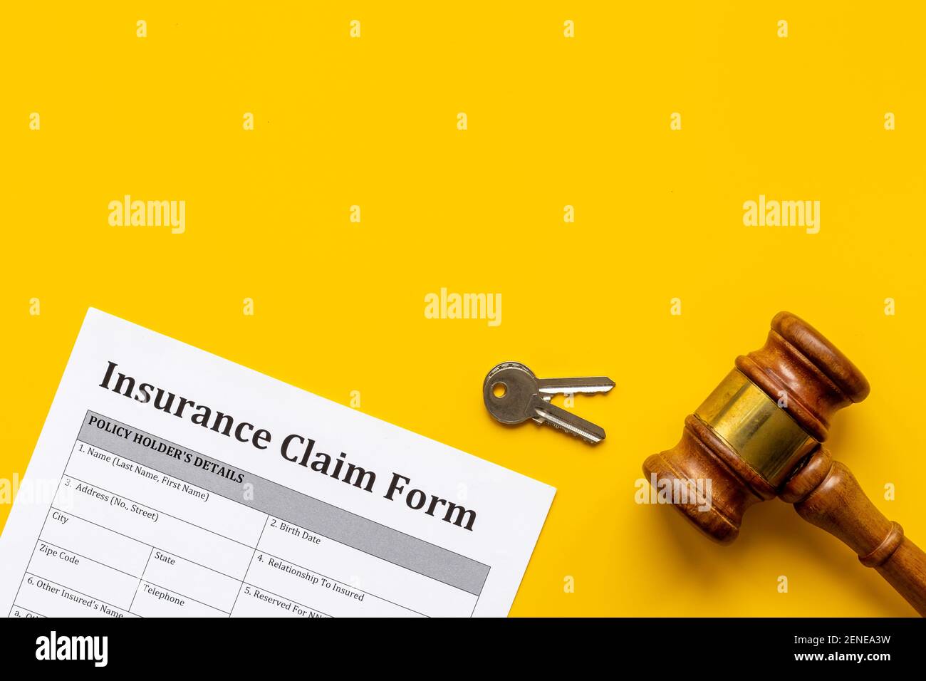 Insurance claim form with judge gavel . Top view Stock Photo - Alamy
