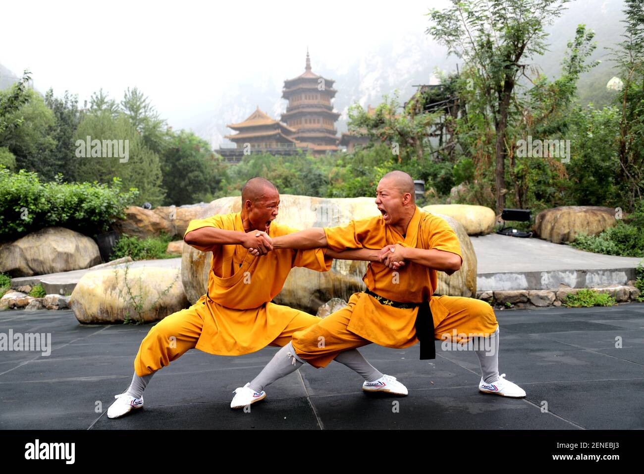 Henan,CHINA-Shaolin boys practice kung fu in the sweltering heat during ...