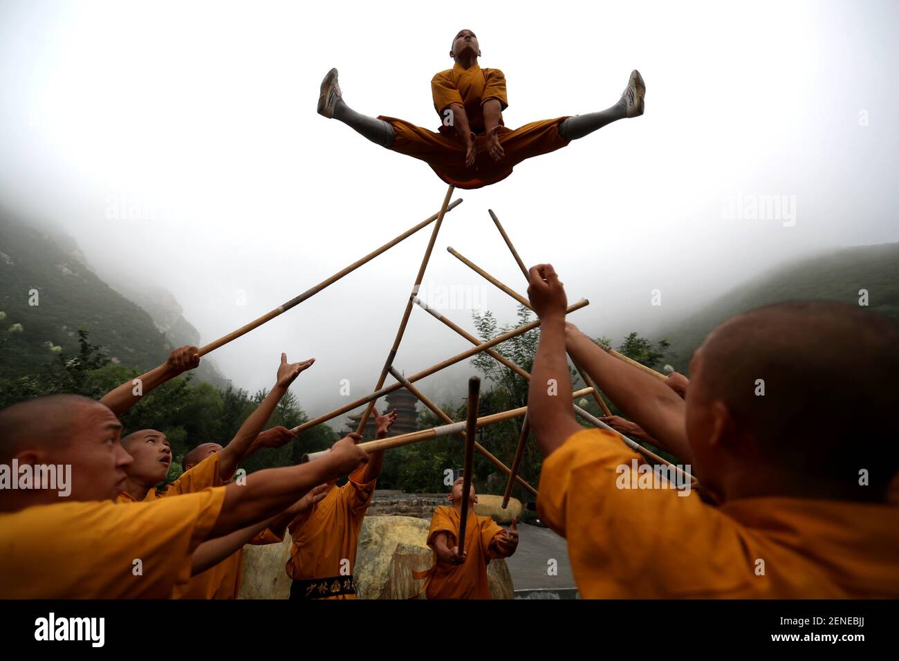 Henan,CHINA-Shaolin boys practice kung fu in the sweltering heat during ...
