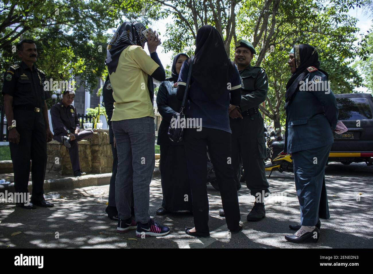 Resident women being given guidance on how to dress according to Sharia ...