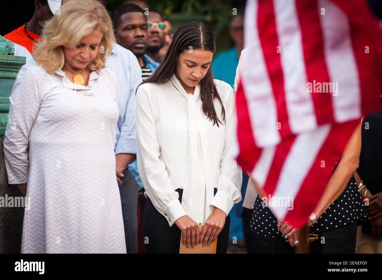 Congressmembers Carolyn Maloney and Alexandria Ocasio-Cortez praying ...