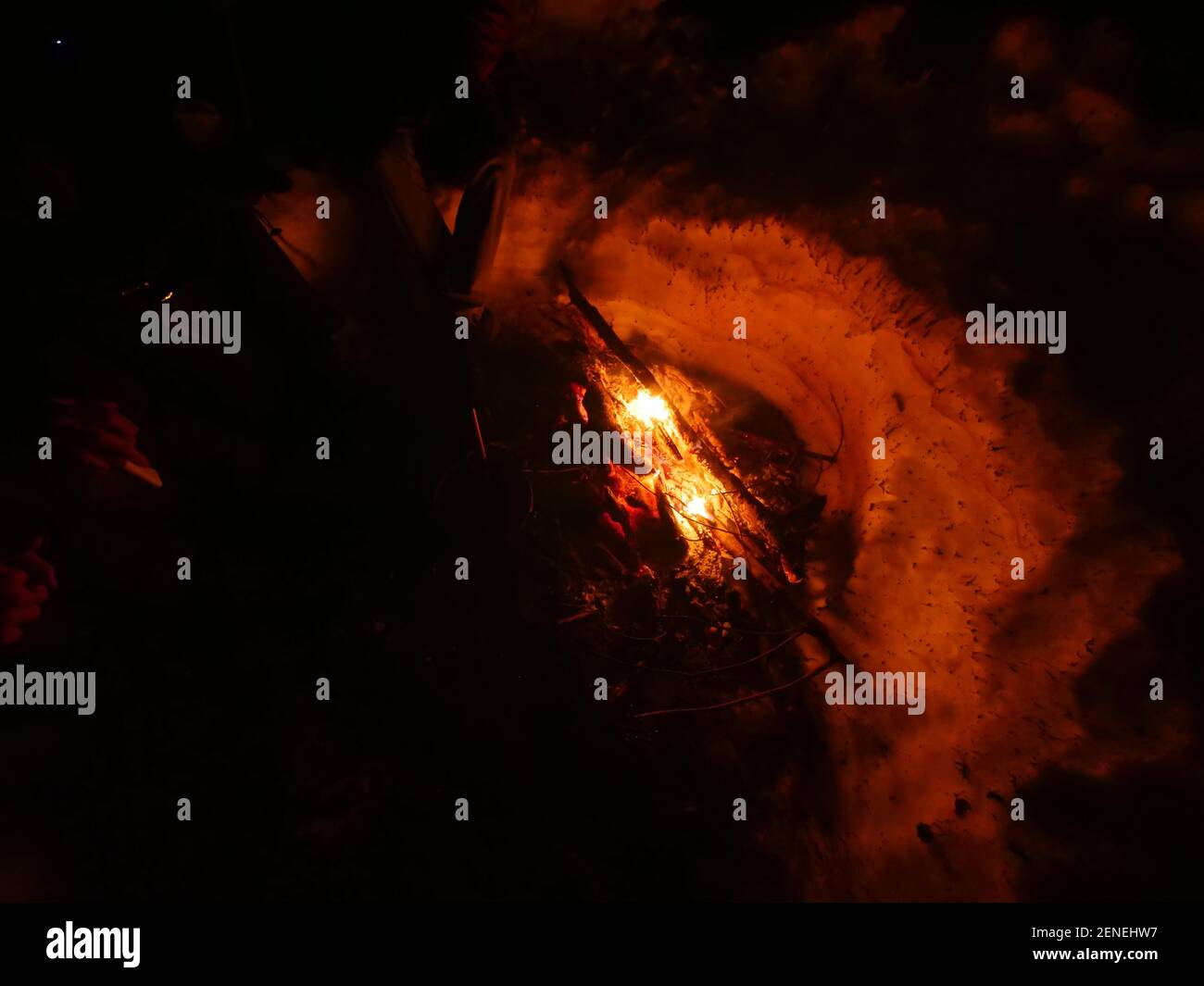 Fire in the Snow Stock Photo - Alamy