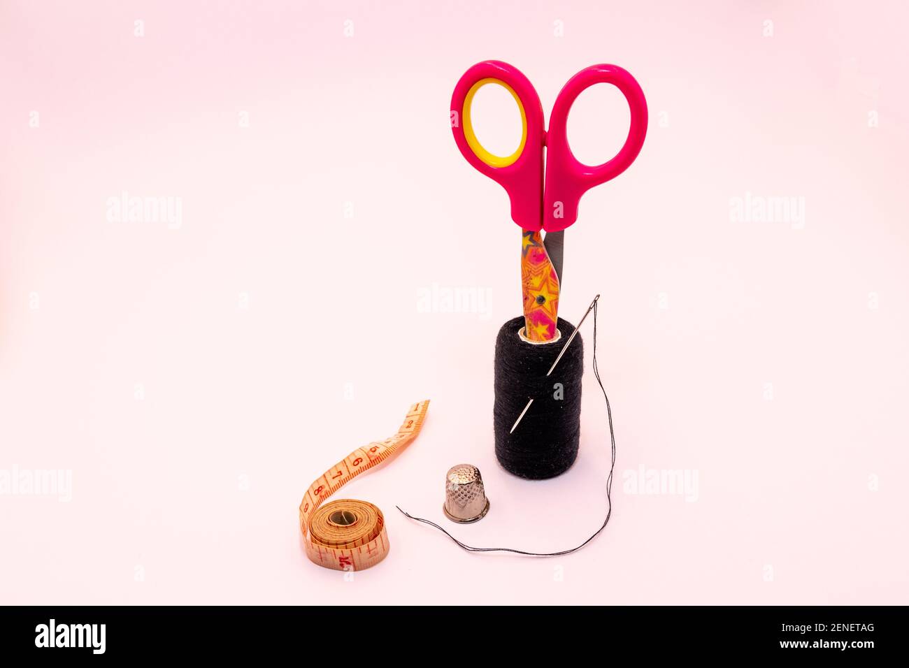 photography of sewing thread and sewing tools on white background Stock ...