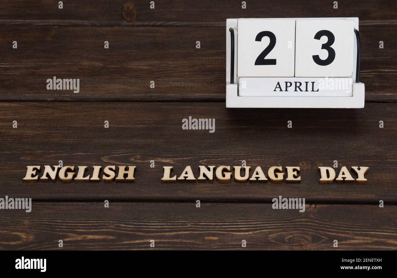 April 23, date on the calendar. English Language Day. Handmade wood ...
