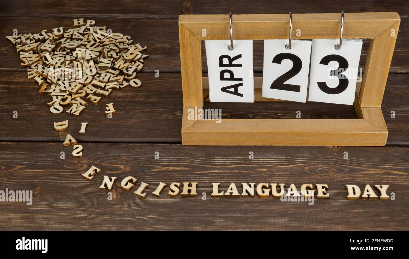 April 23, date on the calendar. English Language Day. Handmade wood ...