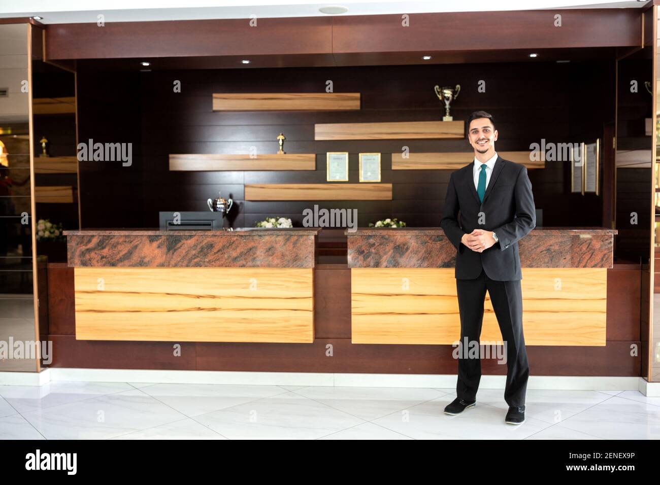 Black Hotel Receptionist High Resolution Stock Photography and Images ...