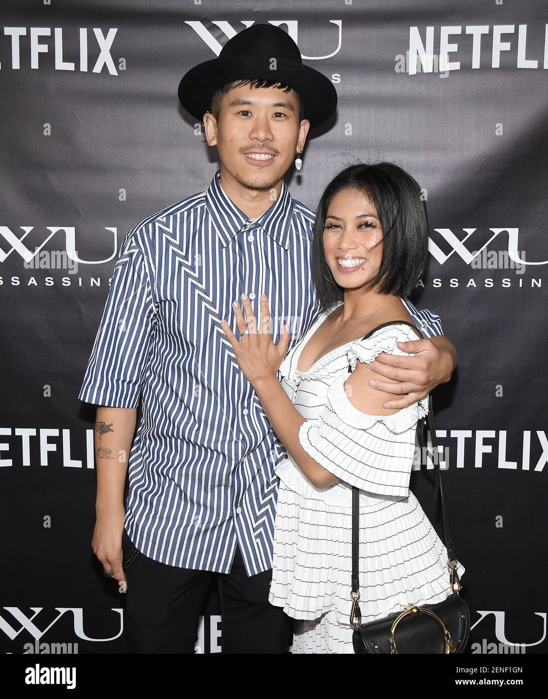 (L-R) Lawrence Kao and FIance Adele Joven arrives at Netflix's WU ASSASSINS Premiere Party held ...