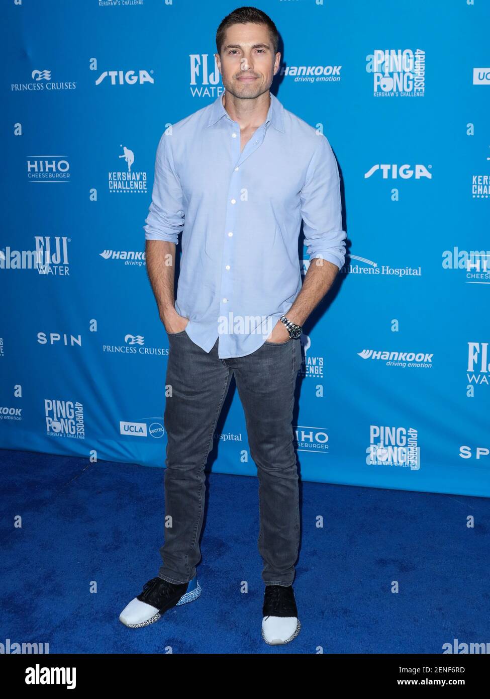 LOS ANGELES, CALIFORNIA, USA - AUGUST 08: Actor Eric Winter arrives at ...