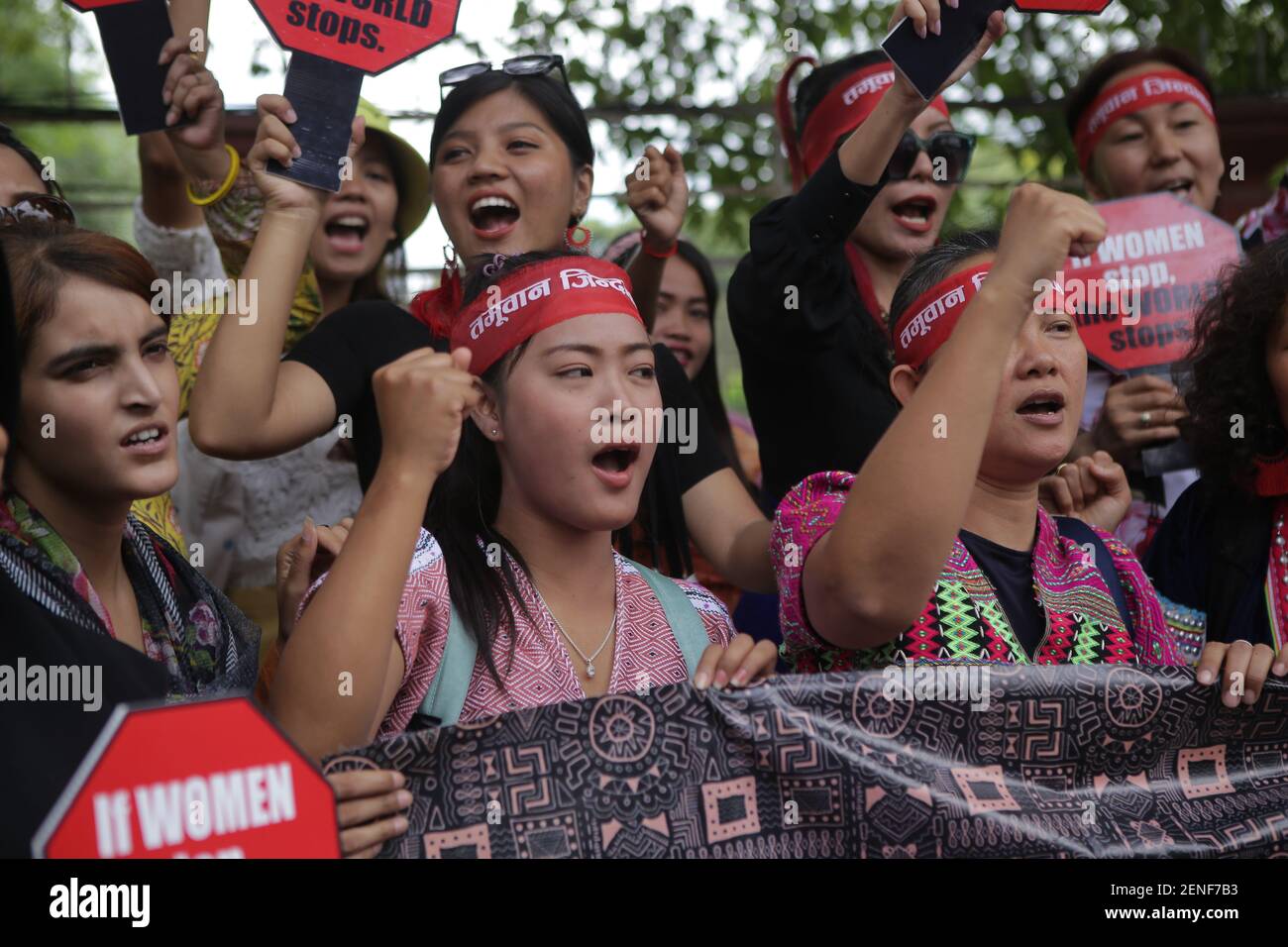 Nepalese Indigenous women chant slogans during the march. Hundreds of ...