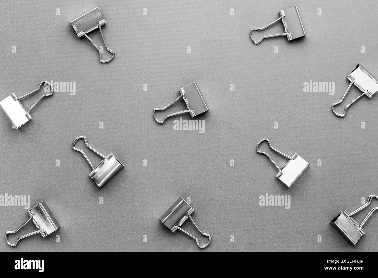 Paper binder clips. Stationery and office supplies background Stock ...