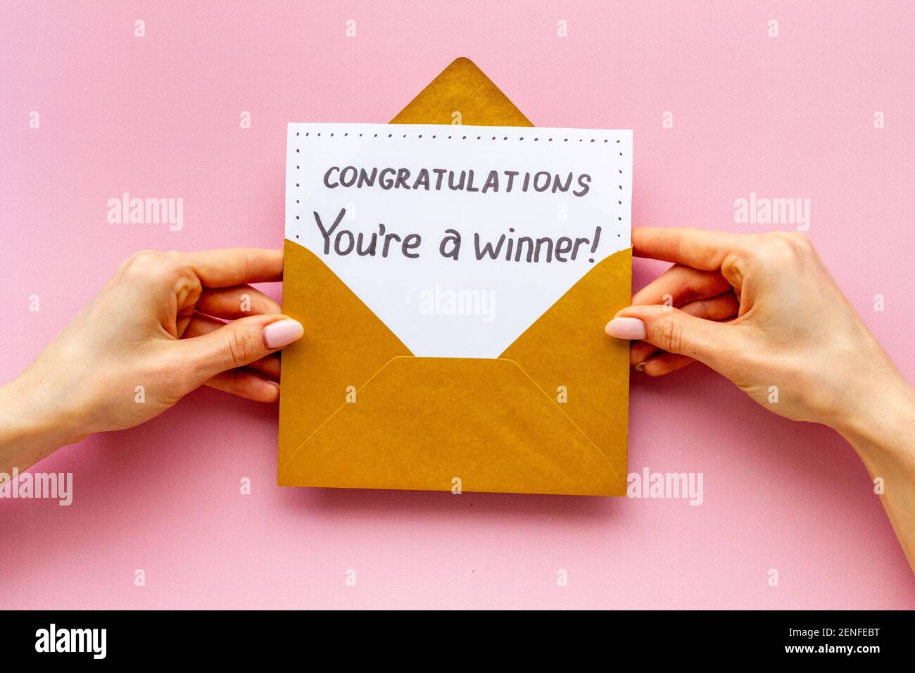 Congratulations award concept -You are a winner card in golden envelope ...