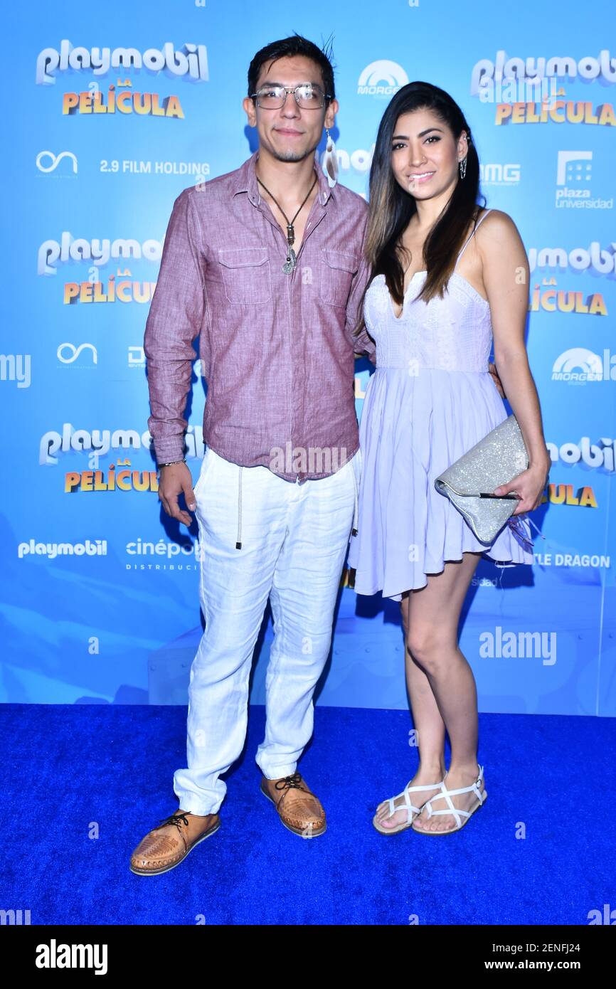 Said Sandoval and Erandi Rojas poses for photos during the blue carpet ...