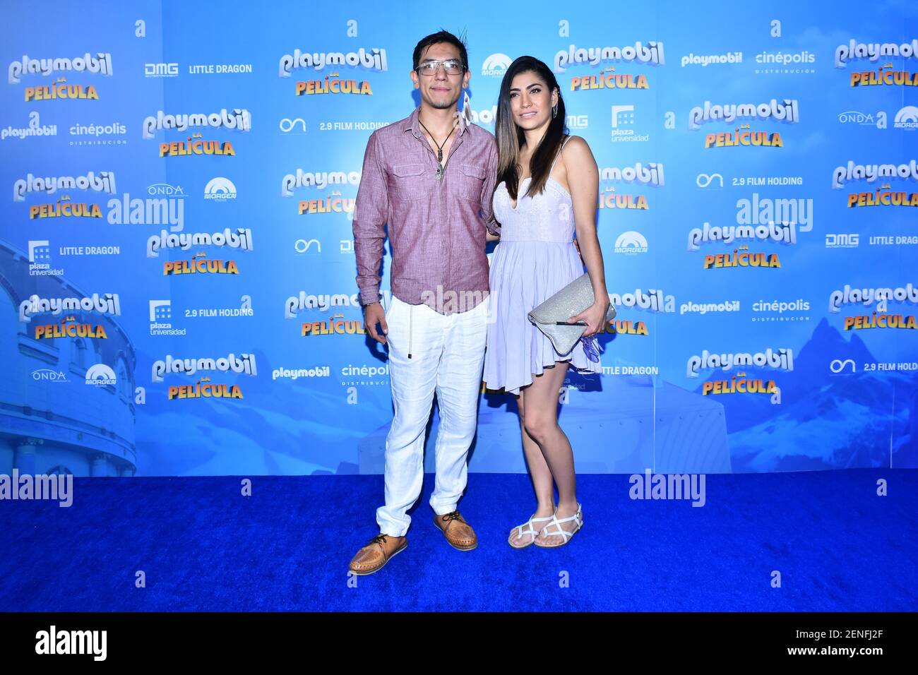 Said Sandoval and Erandi Rojas poses for photos during the blue carpet ...