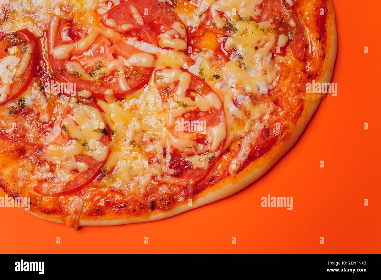 Pepperoni Pizza on an orange background above view. Delicious homemade ...