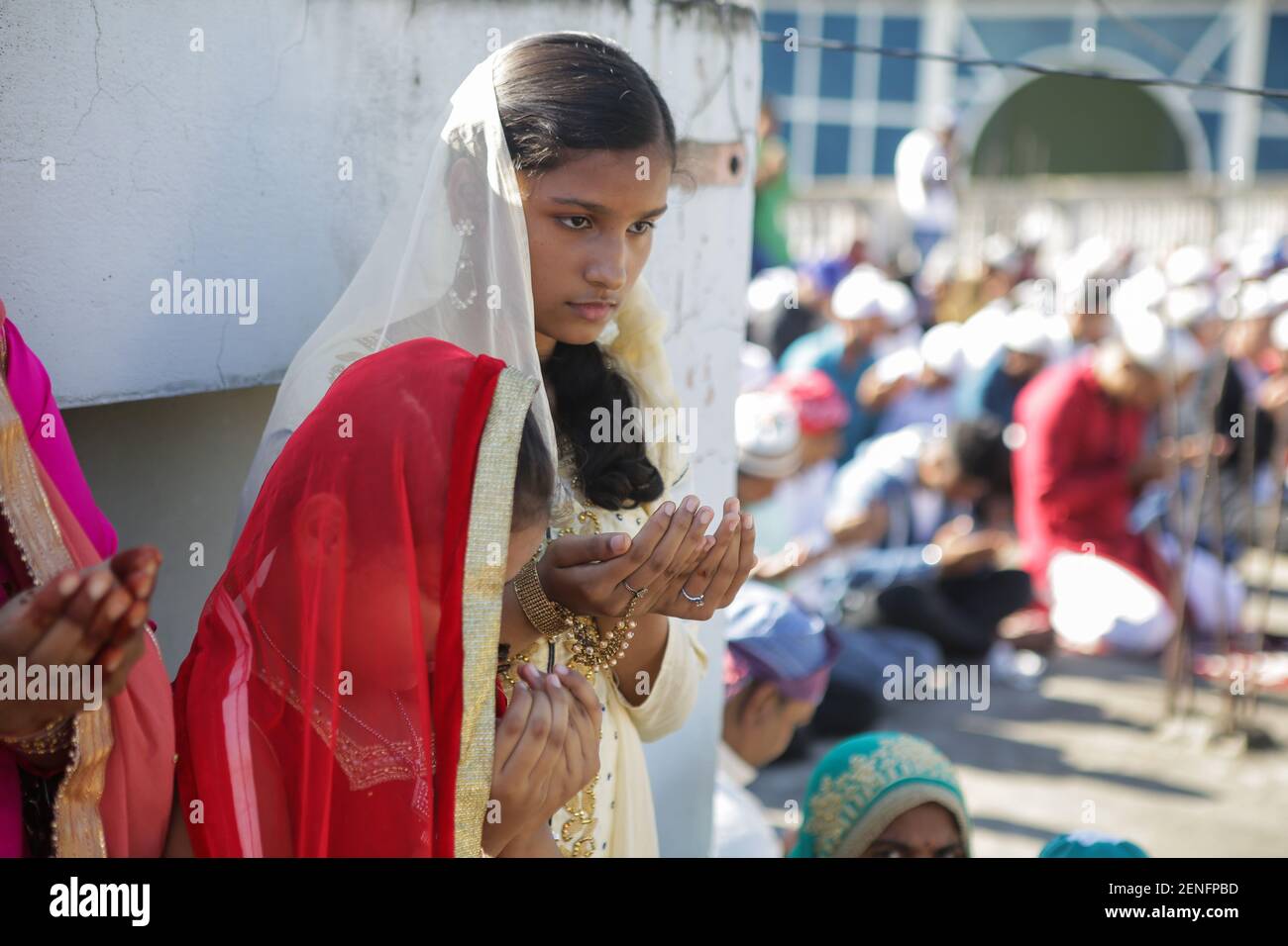 A Muslim woman prays at the Takiya Jame mosque during the celebration ...
