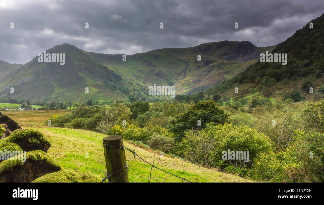 Cloudy sky and sunshine in Patterdale valley, in Lake District, Cumbria ...