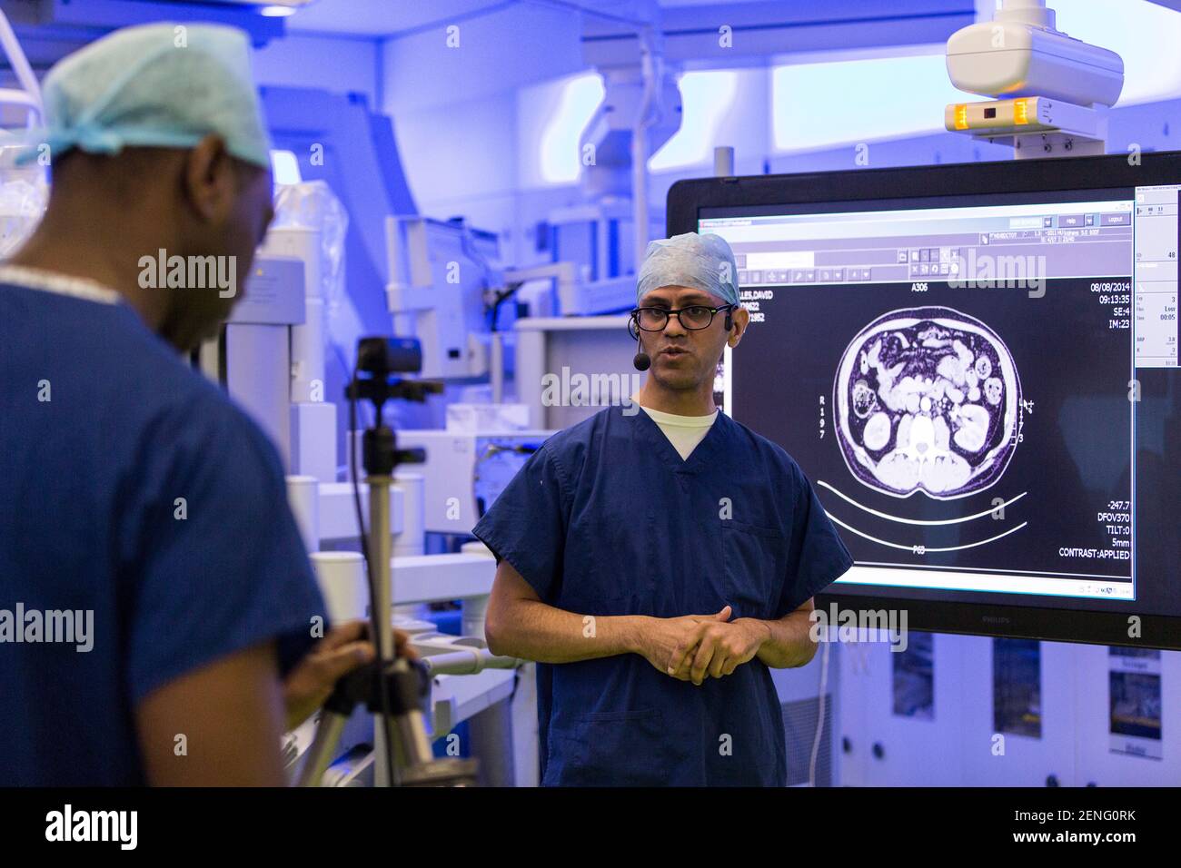 Doctors & Surgeons perform operation Stock Photo - Alamy