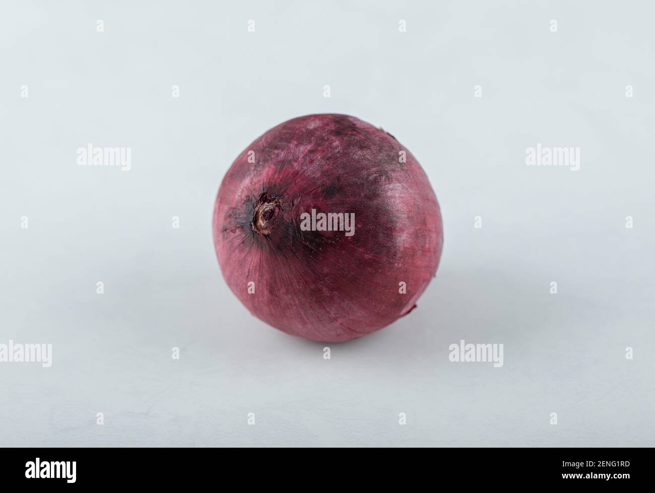 Fresh ripe red onion on white background Stock Photo - Alamy
