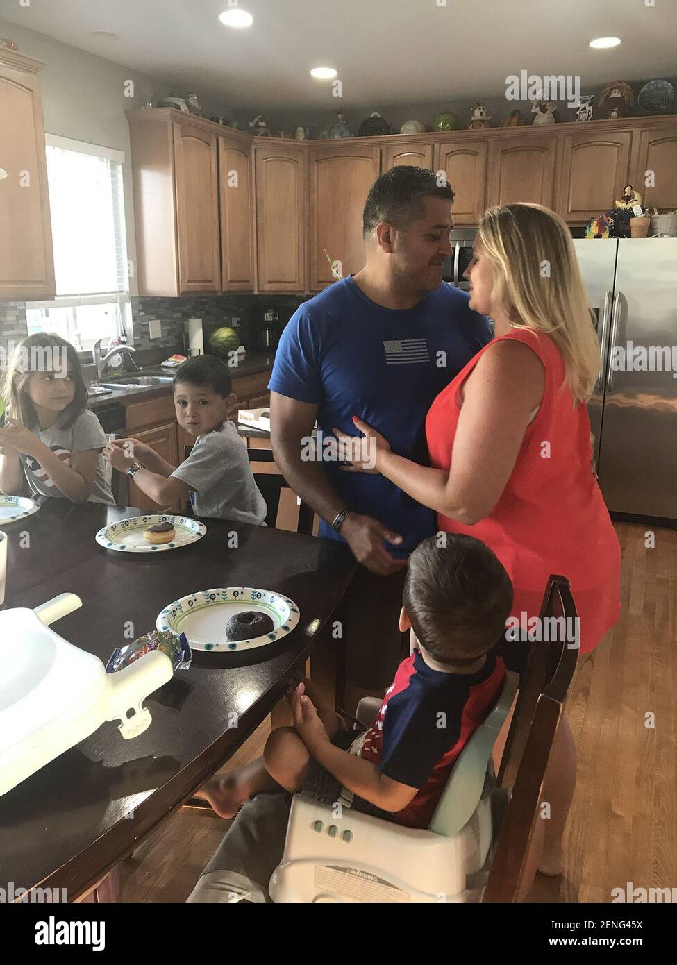 Aurora Police Officer Marco Gomez enjoys family time with his wife ...