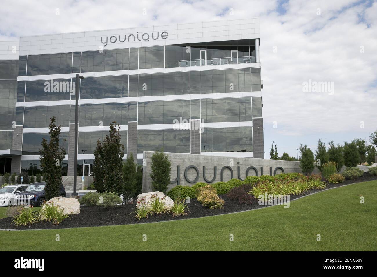 A logo sign outside of the headquarters of Younique in Lehi, Utah on ...