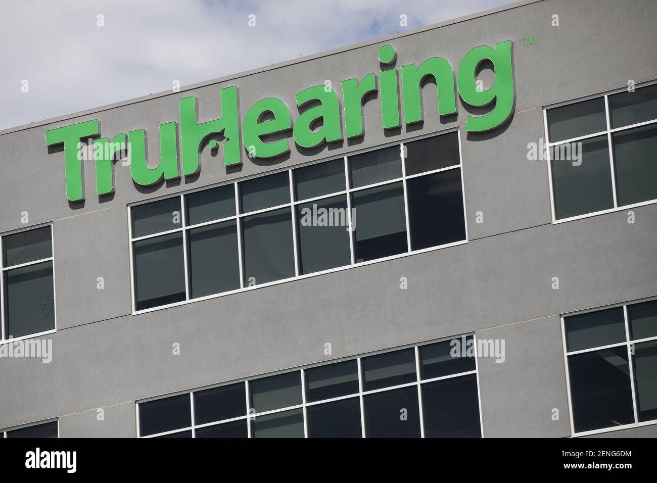 A logo sign outside of the headquarters of TruHearing in Draper, Utah ...