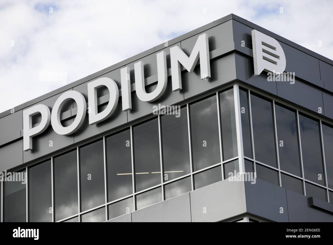 A logo sign outside of the headquarters of software provider Podium in ...