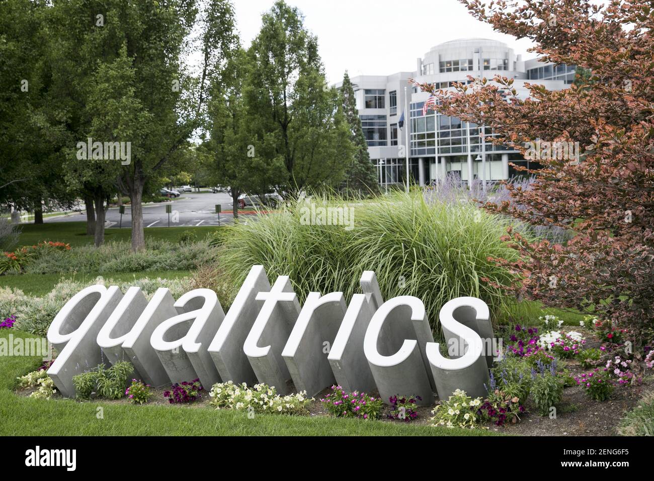 A logo sign outside of the headquarters of Qualtrics in Provo, Utah on ...