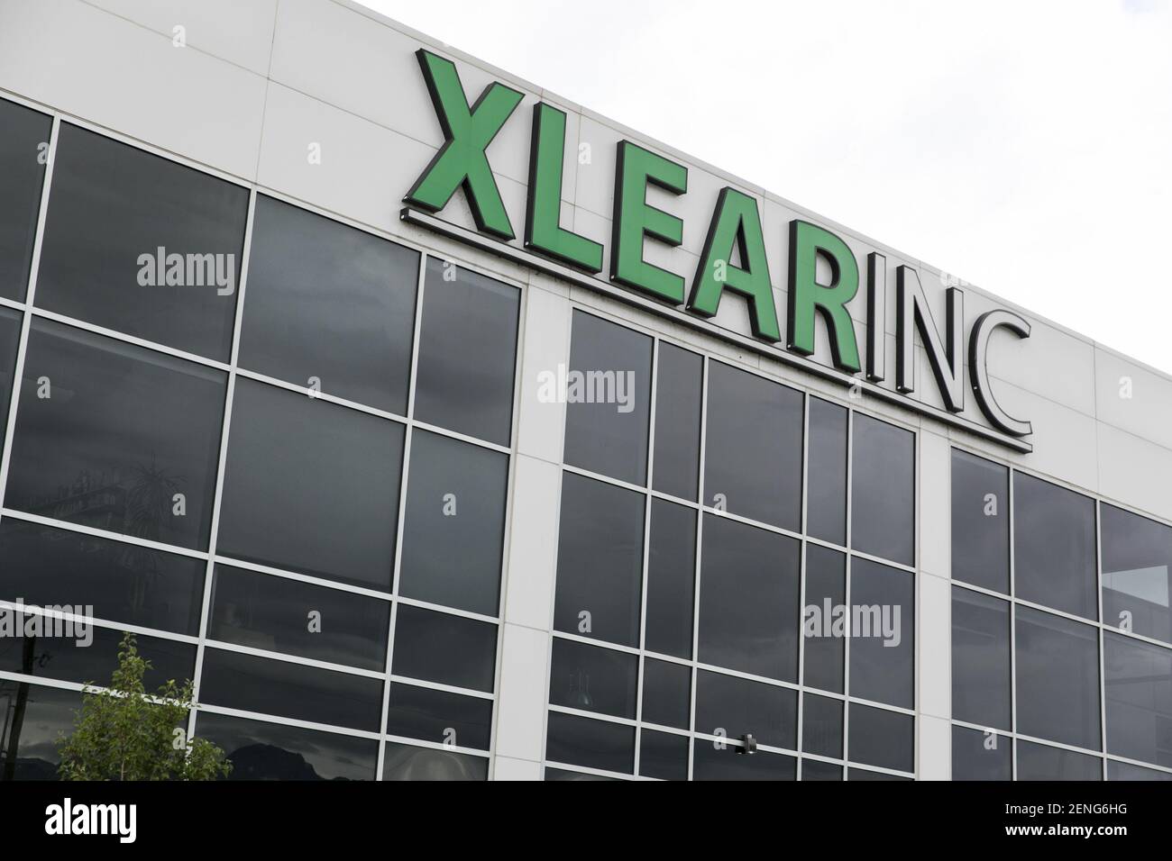 A logo sign outside of the headquarters of Xlear, Inc., in American ...