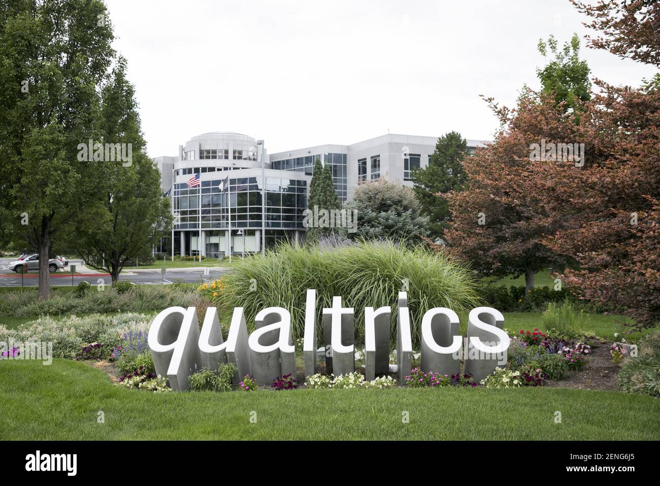 A logo sign outside of the headquarters of Qualtrics in Provo, Utah on ...