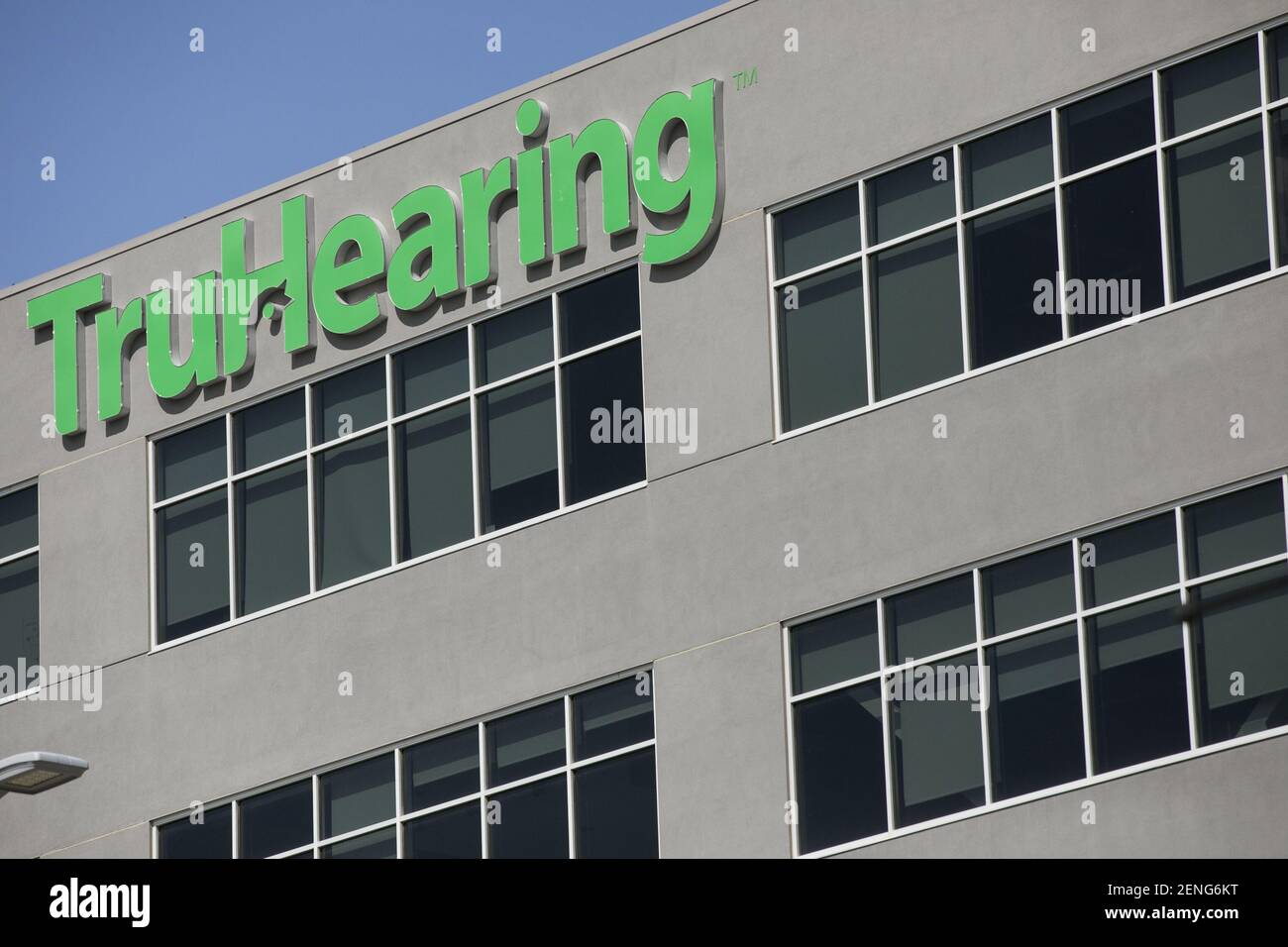 A logo sign outside of the headquarters of TruHearing in Draper, Utah ...